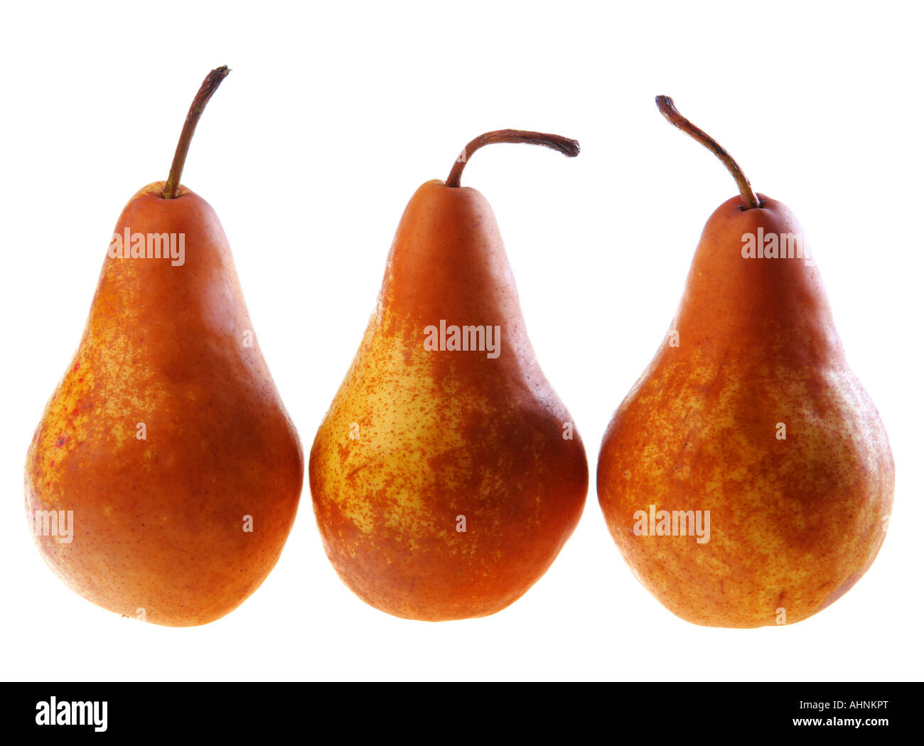 Closeup brown pear group detail on white background Stock Photo - Alamy