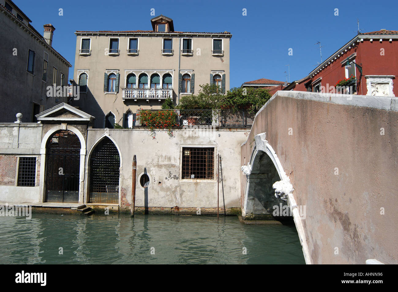 Canal and doorways venice hi-res stock photography and images - Alamy
