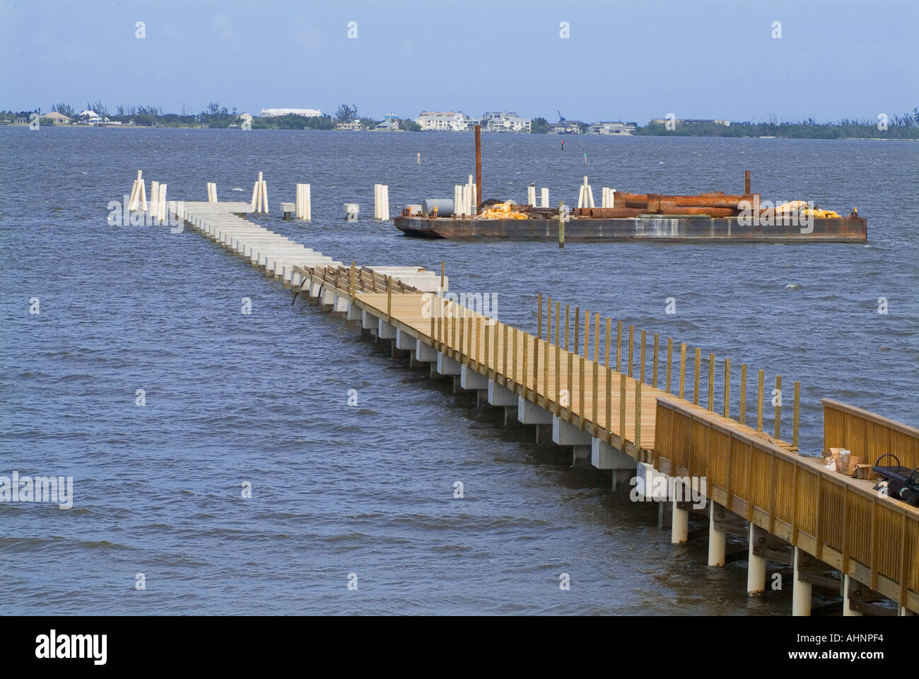 dock pier in various stages of construction barge IRL Indian River ...