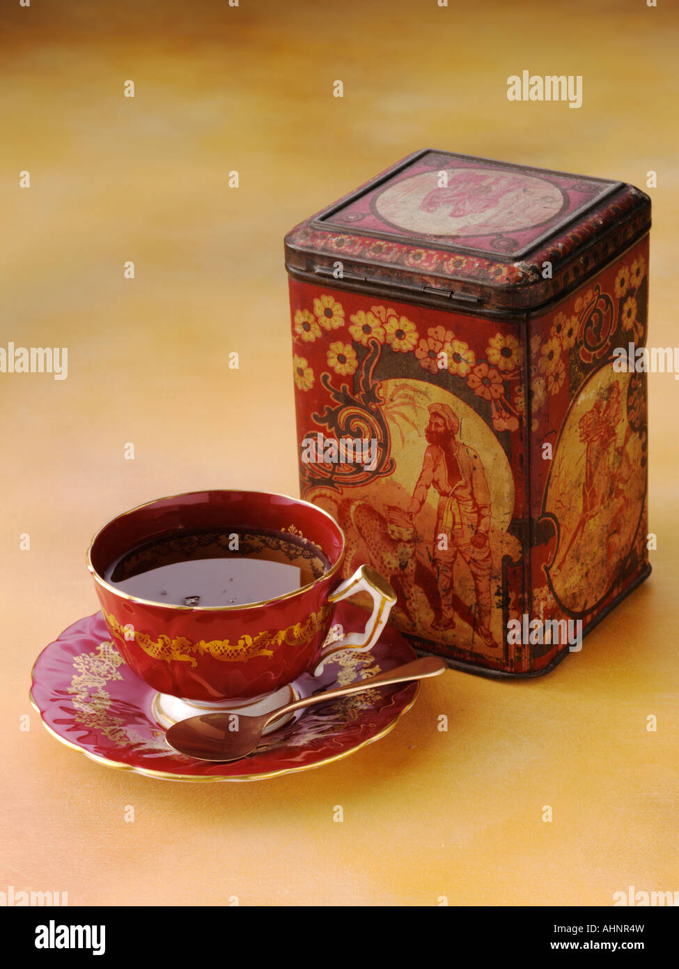 A traditional tea caddy with a cup of tea editorial photograph Stock ...
