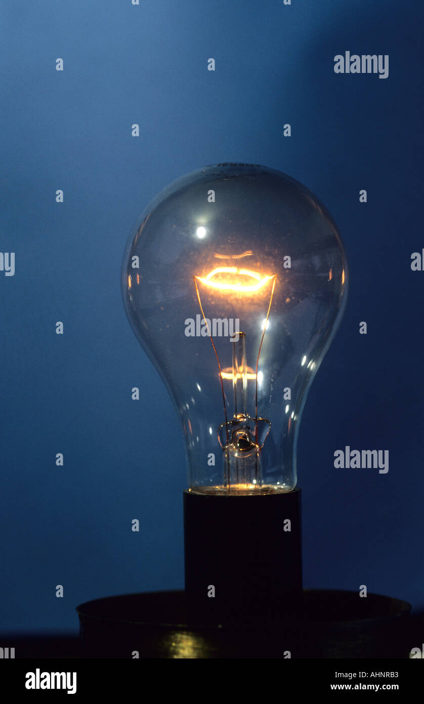 Light bulb showing the glow of wires Tungsten filament Stock Photo - Alamy