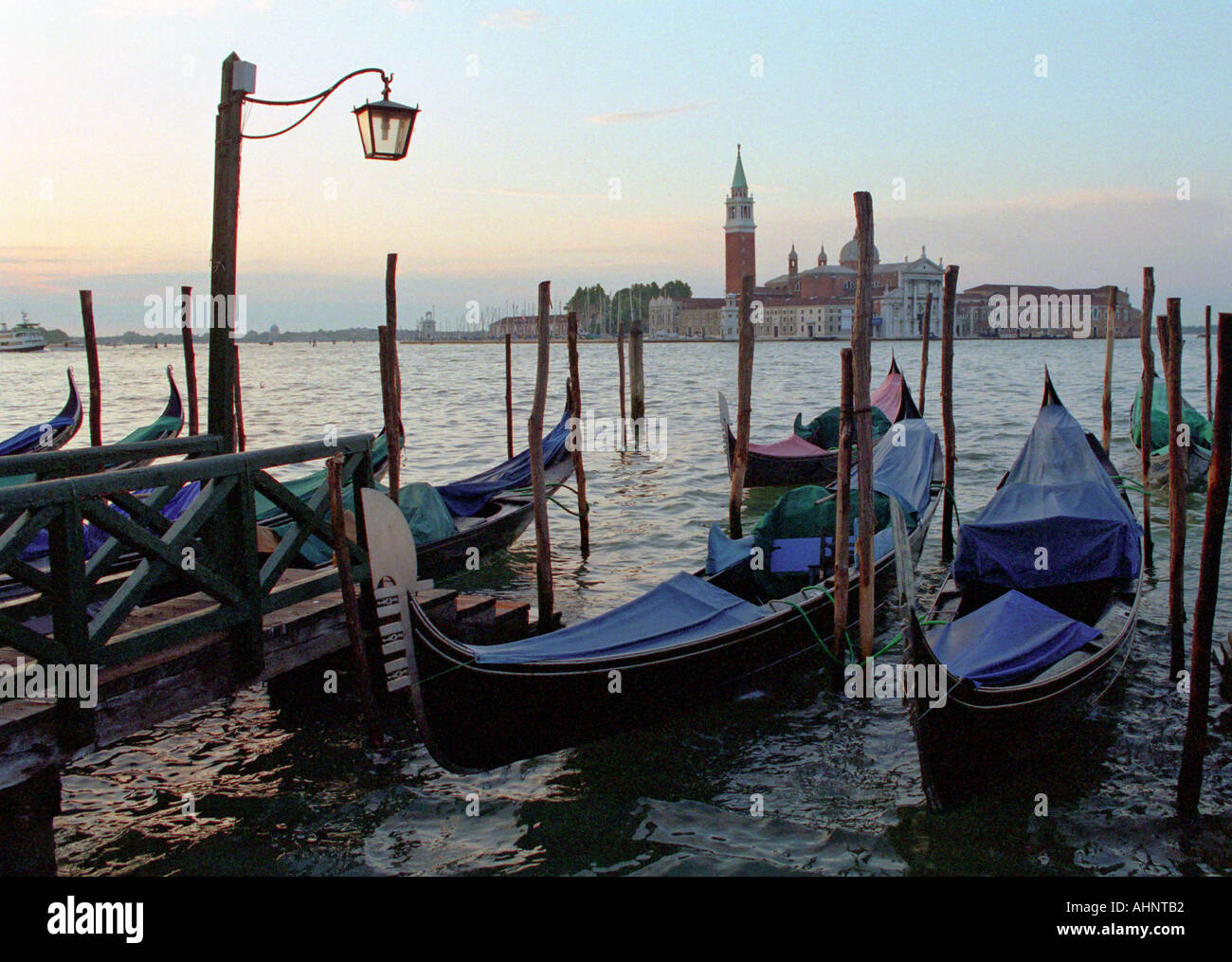 Sunset venetian lamp post Venice Lagoon St Marks basin Venice Italy EU ...