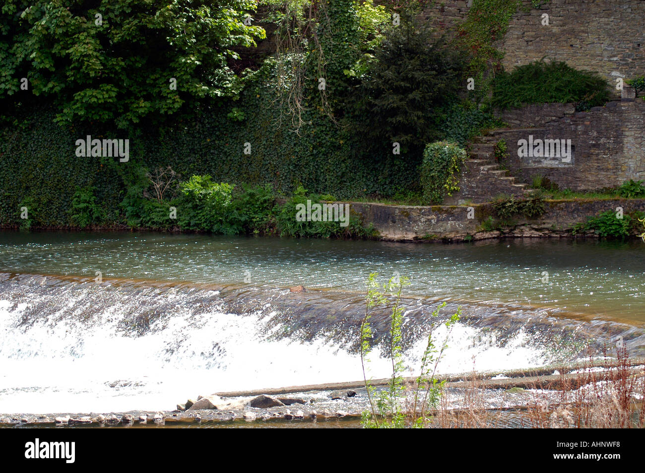 The River Teme in Shropshire flows over a weir Stock Photo - Alamy