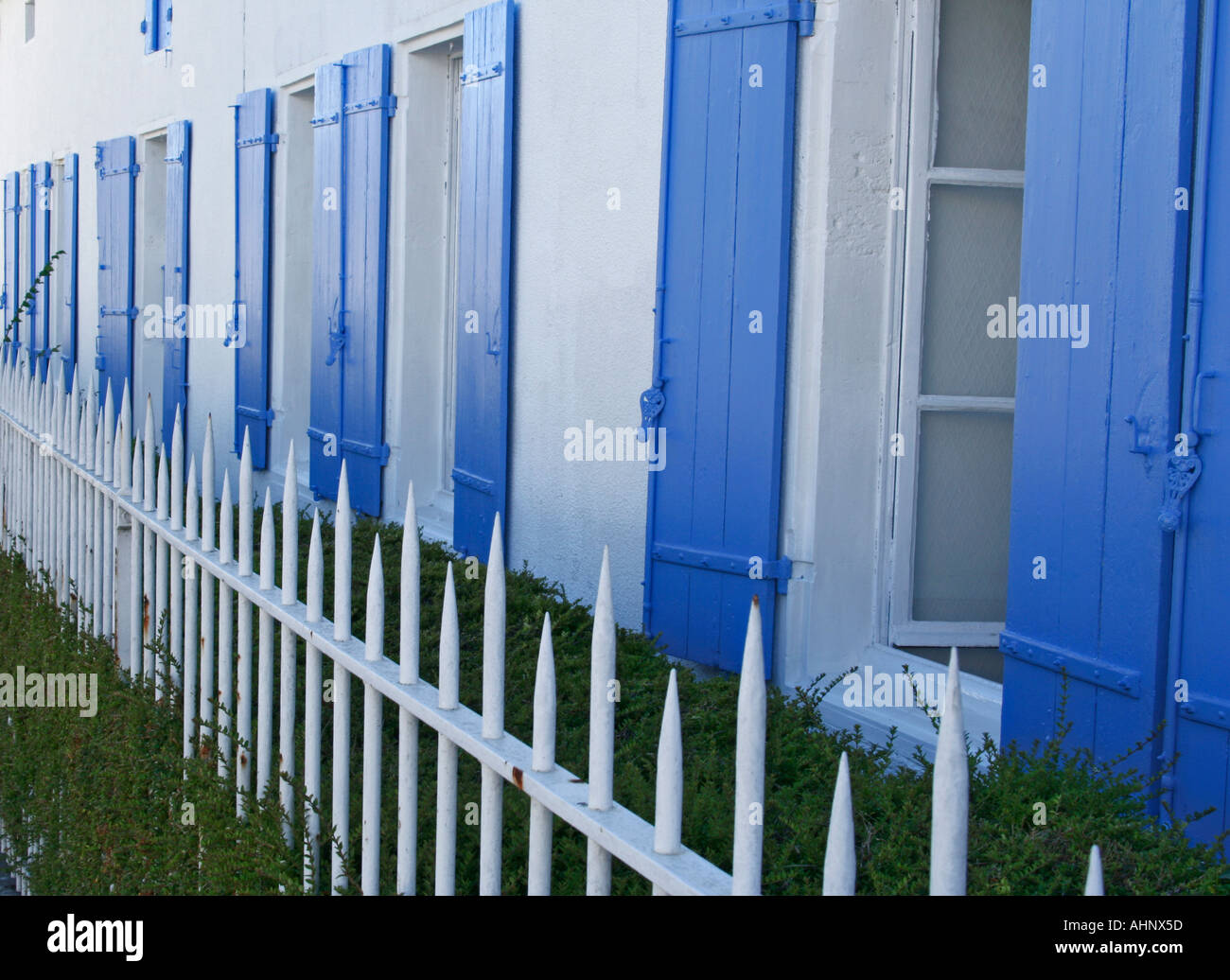 Row of shuttered windows hi-res stock photography and images - Alamy