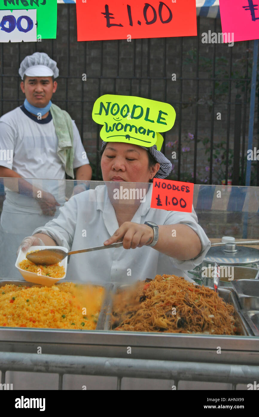 Noodle woman food vender Stock Photo - Alamy