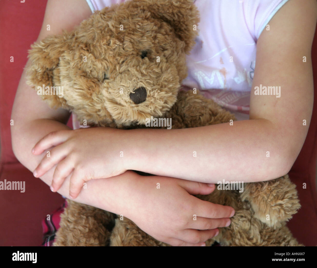 young girl holding teddy bear Stock Photo - Alamy