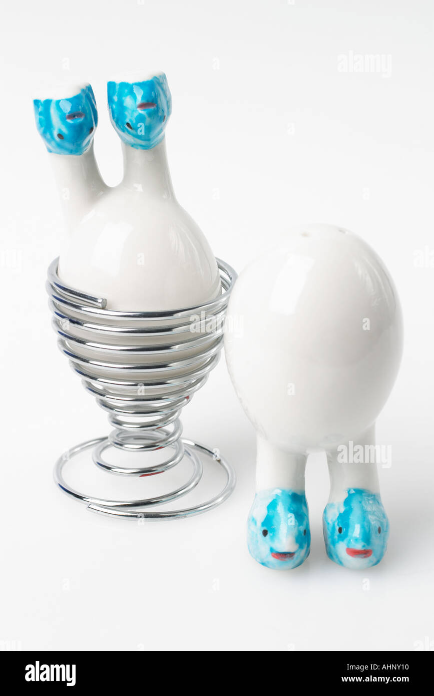Fish shaped salt shaker and pepper shaker with an eggcup Stock Photo ...