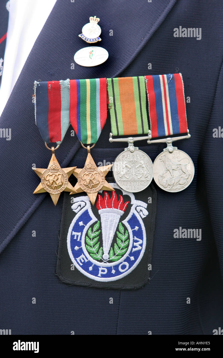 Medals and badges of a Far east prisoner of war veteran Stock Photo - Alamy