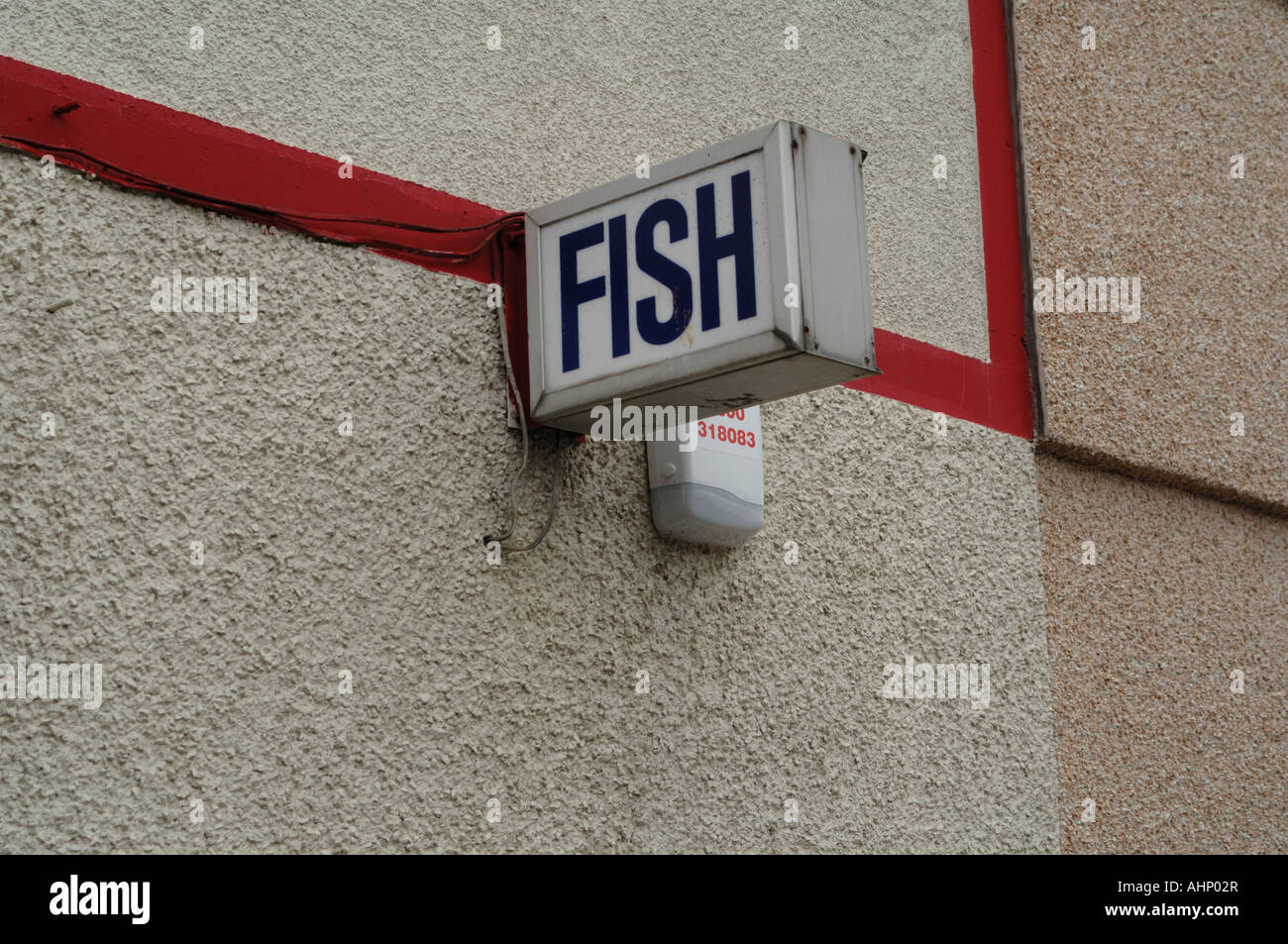 Fish sign above a shop in Leslie near Glenrothes Fife Stock Photo - Alamy