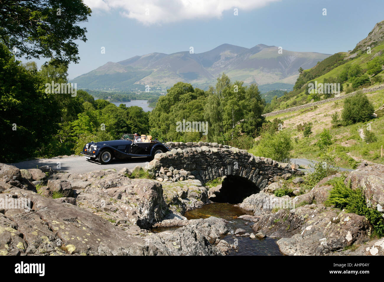 Ashness Bridge in the English Lake District with a Morgan 4/4 crossing ...
