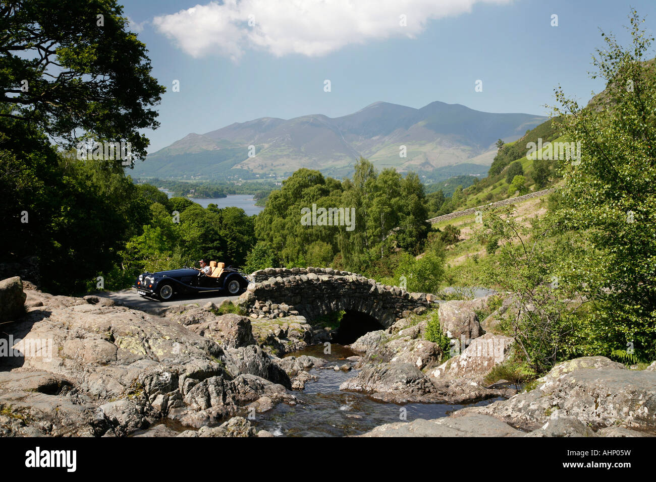 Ashness Bridge in the English Lake District with a Morgan 4/4 crossing ...