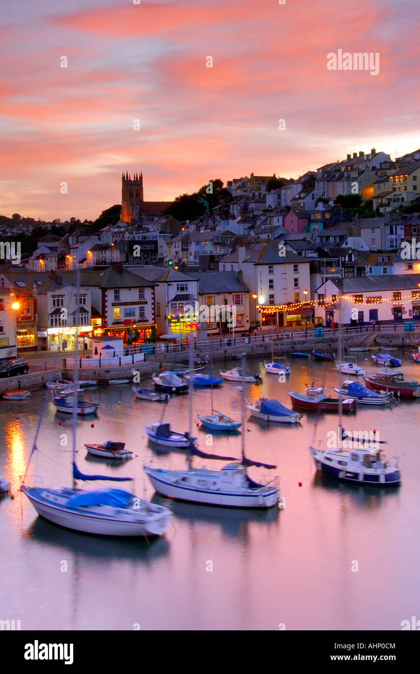 The small fishing town of Brixham on the South Devon coast at sunset ...