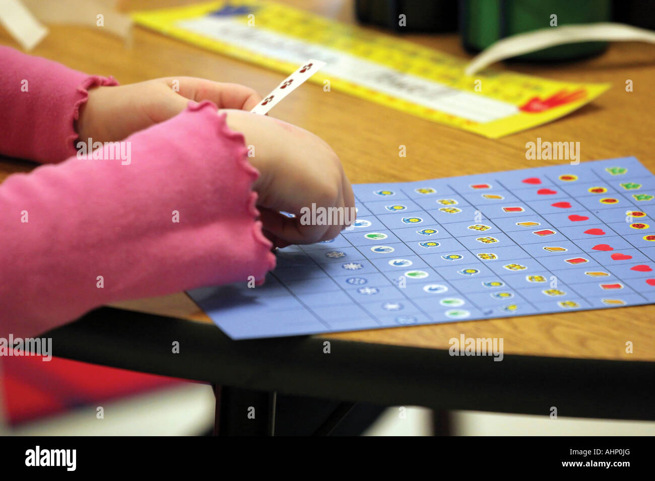 Young girl working on a class activity in Kindergarten Stock Photo - Alamy