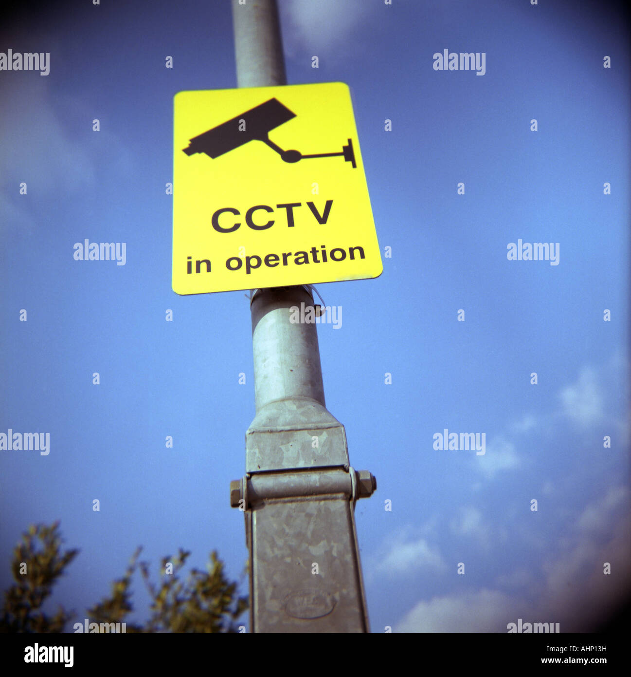 CCTV camera in use sign on an industrial estate Stock Photo - Alamy