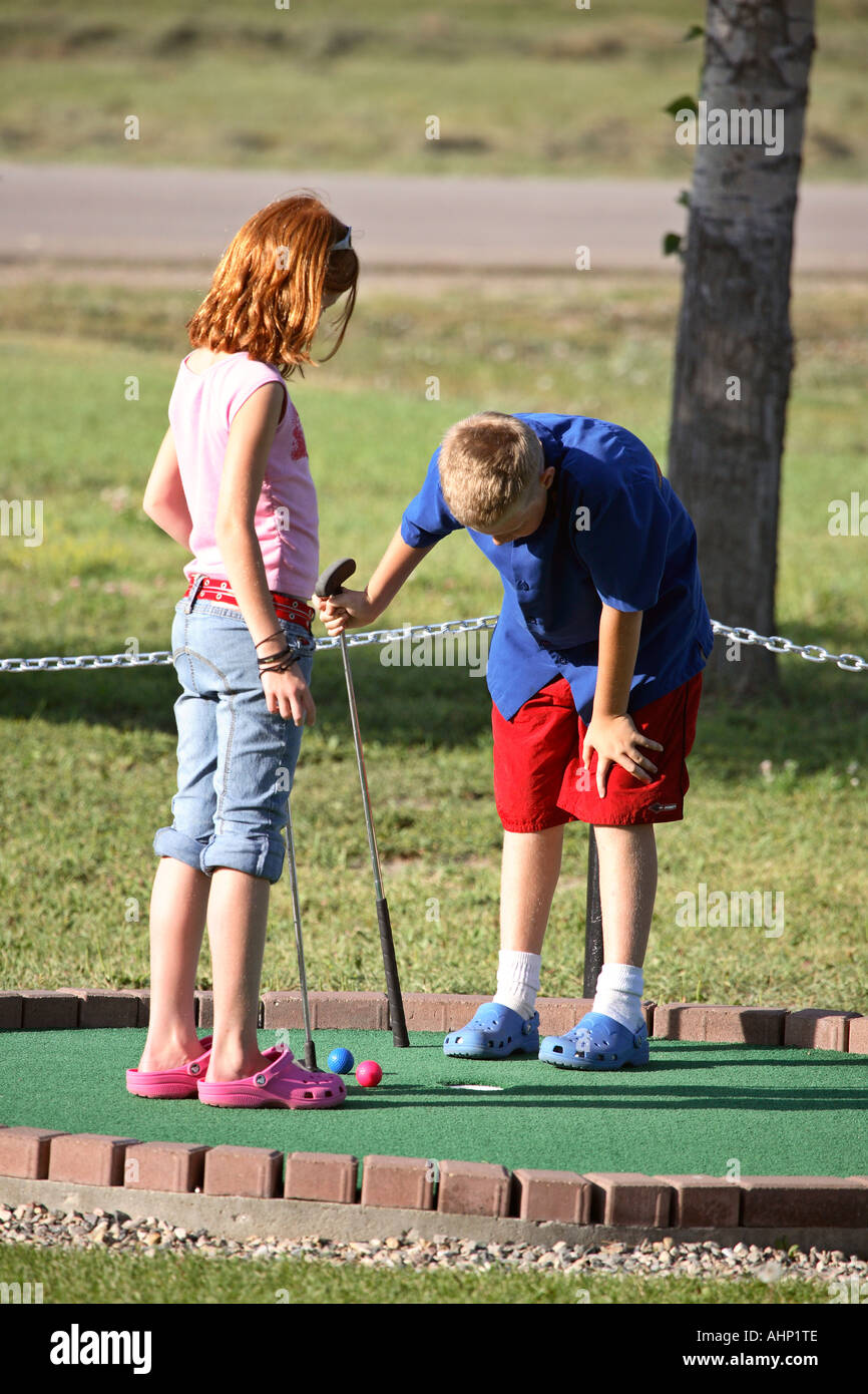 Children playing mini-golf in Moose Jaw in scenic Saskatchewan Canada ...
