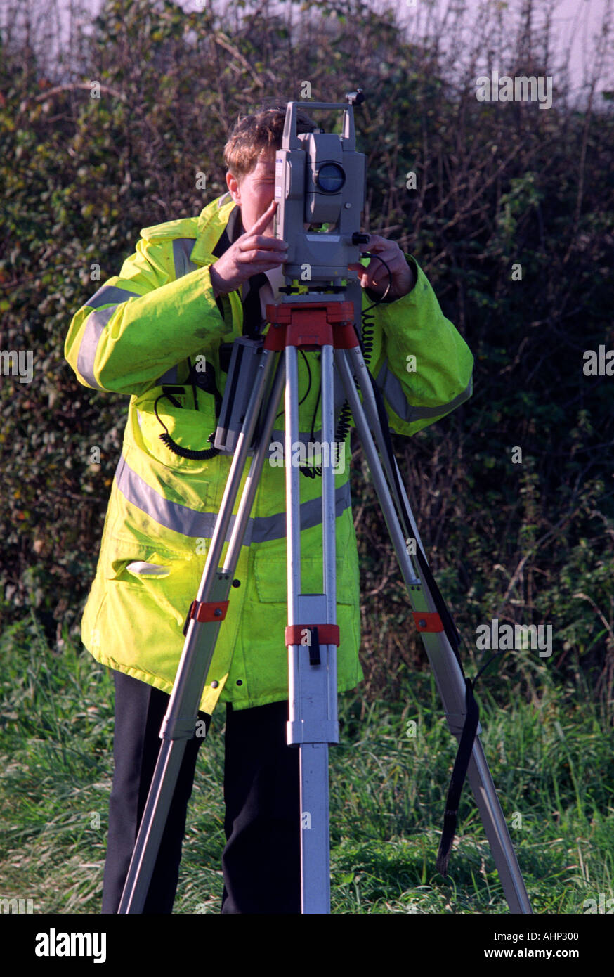 A Traffic Police Officer takes measurements at the scene of a road ...