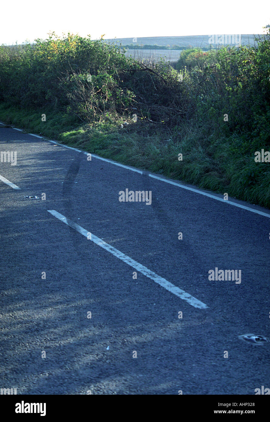 Skid marks left on a road after a car accident Stock Photo - Alamy
