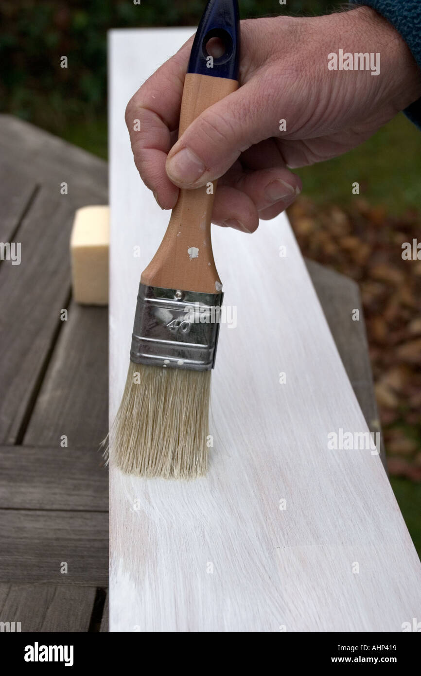 painting a board Stock Photo - Alamy