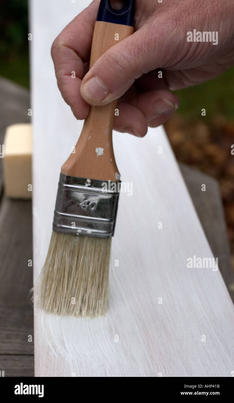 painting a board Stock Photo - Alamy