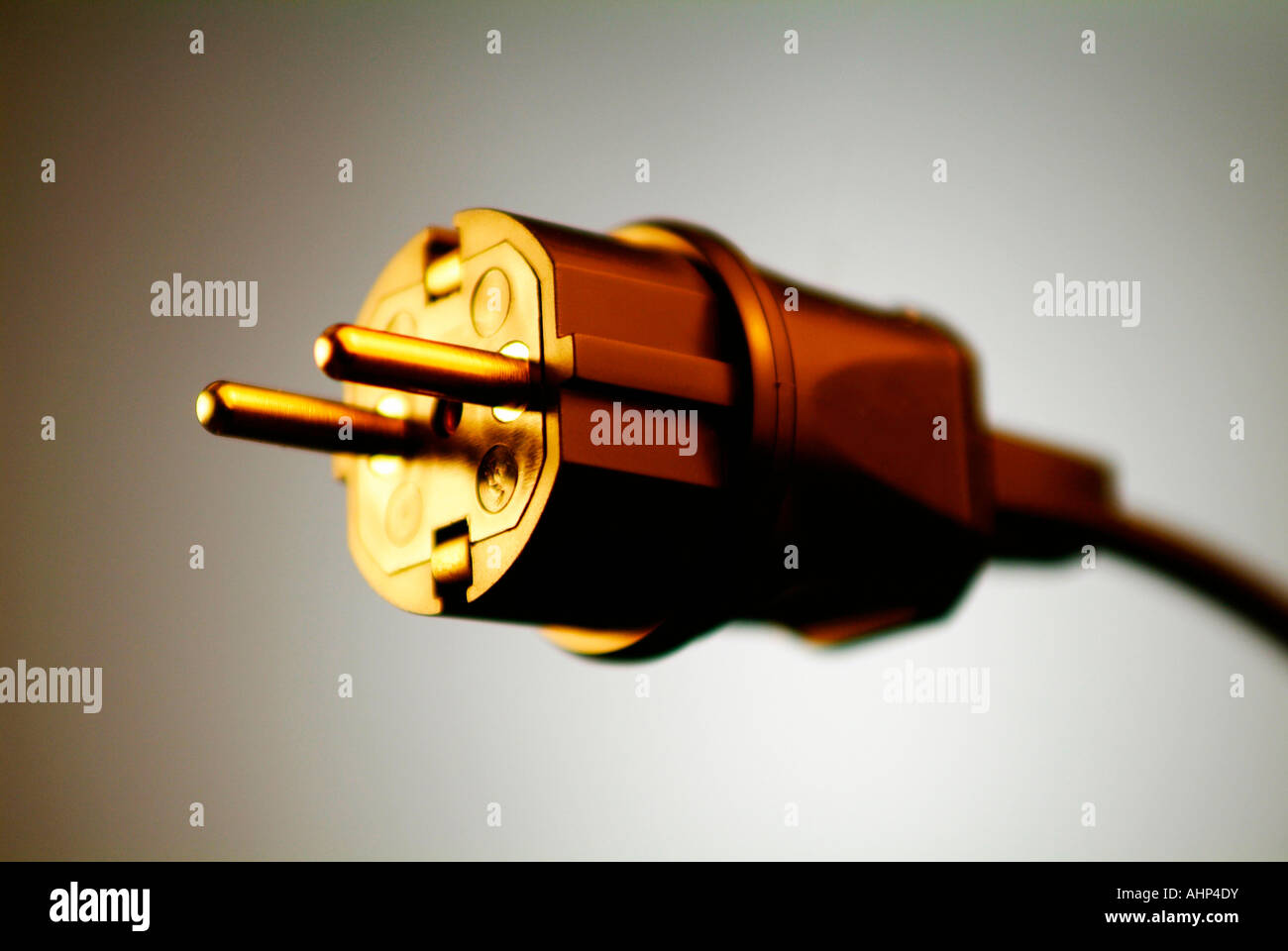 Plug on black and white background Stock Photo - Alamy