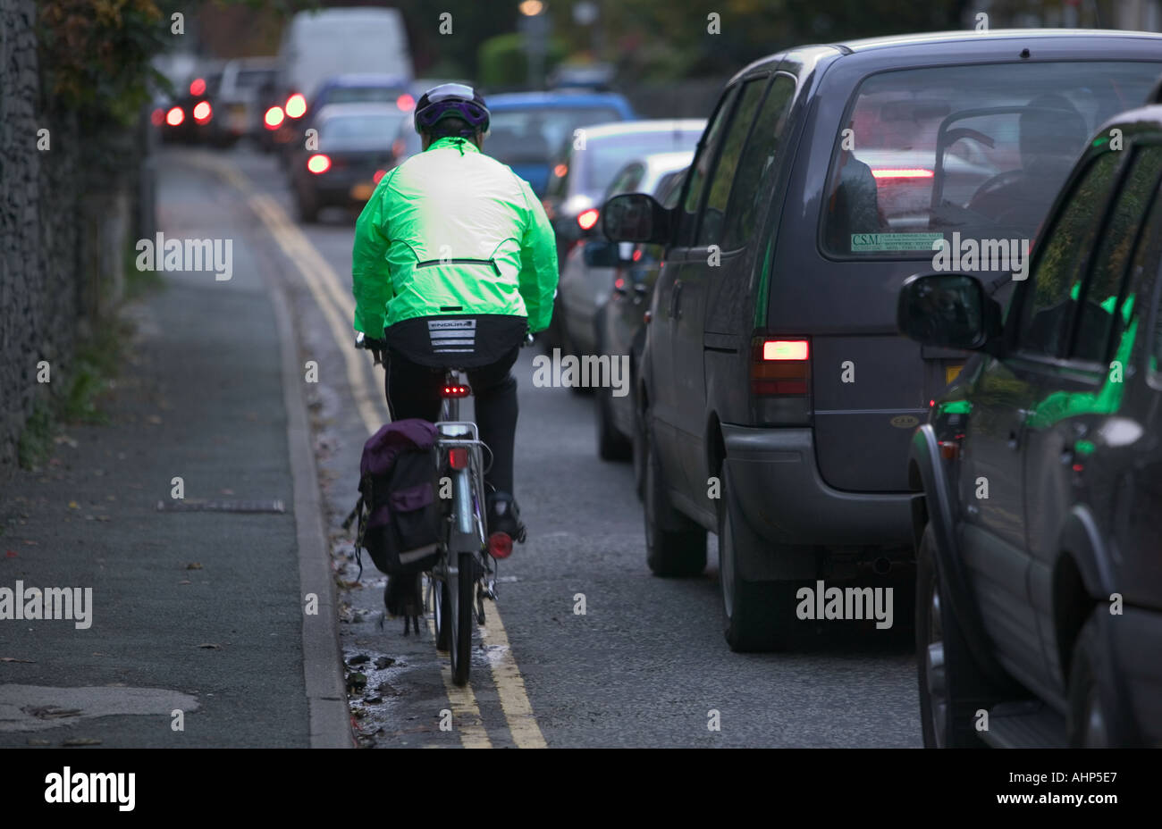 cycling through a traffic jam Stock Photo - Alamy