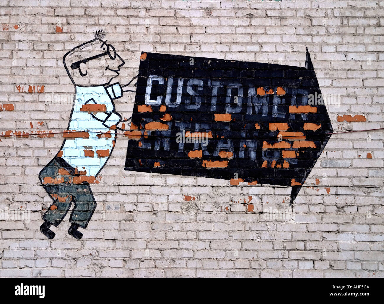 1950s sign painted on white brick customer parking in Regina in scenic ...