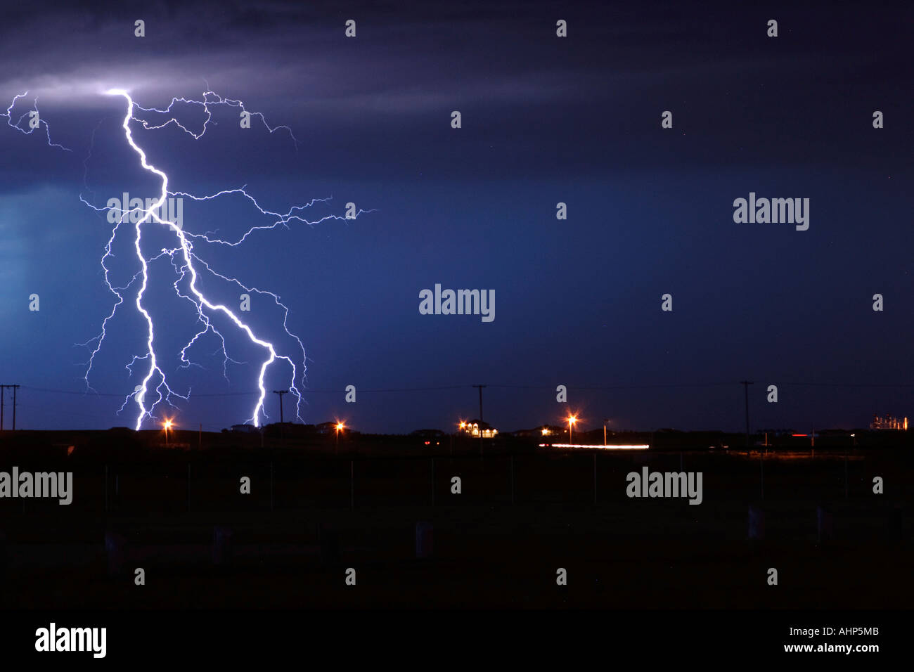 lightning bolts near agpro grain at Moose Jaw Stock Photo - Alamy