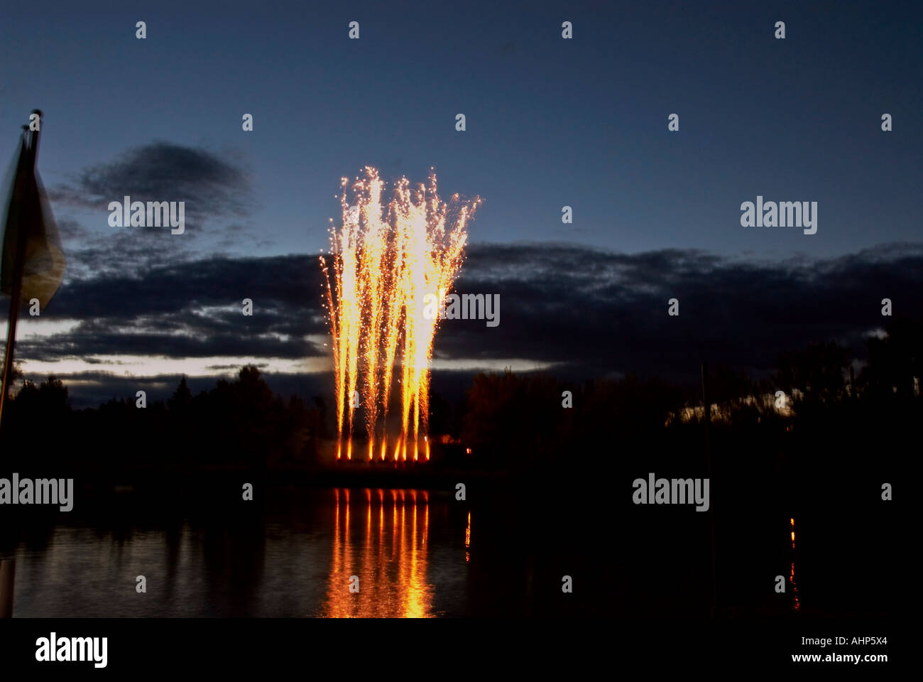 Fireworks over water Stock Photo - Alamy