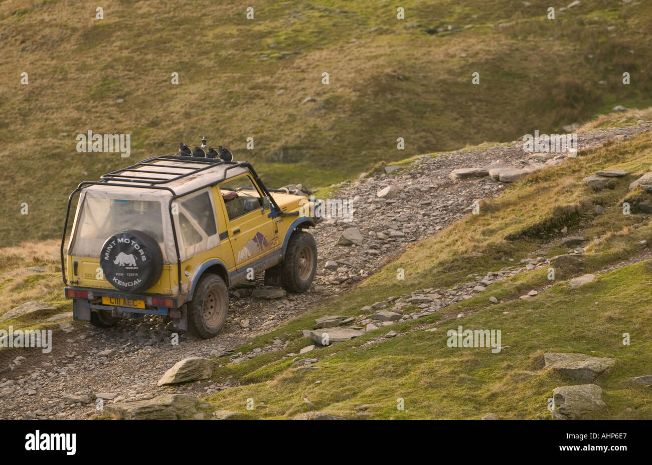 Off road vehicles on the Walna Scar road above Coniston Stock Photo - Alamy