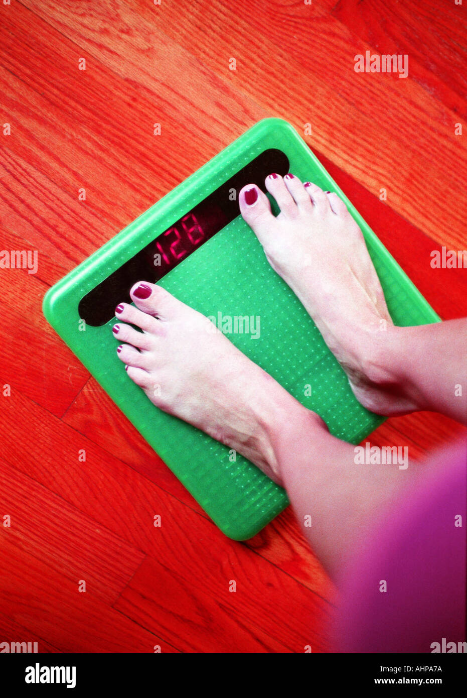 Feet on scales hi-res stock photography and images - Alamy