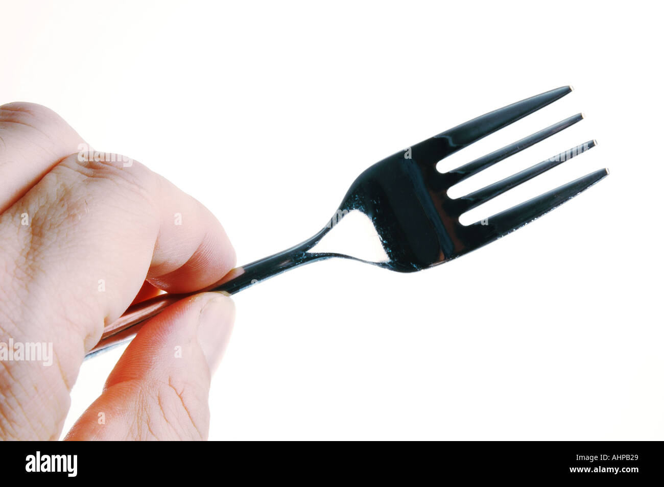 Fork on hand hi-res stock photography and images - Alamy
