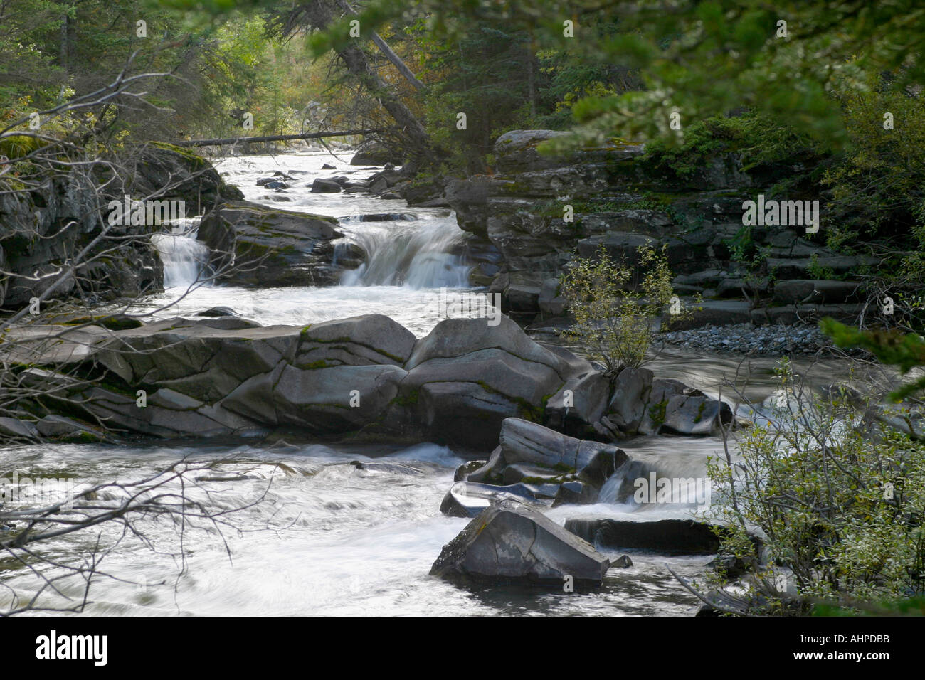 Mountain water stream running in hi-res stock photography and images ...