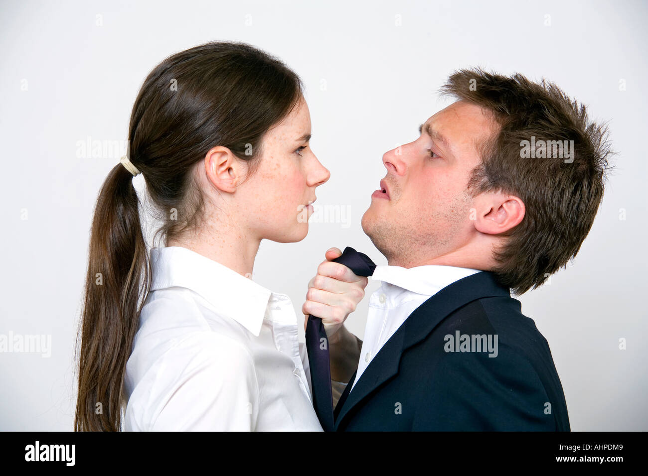 Woman bullying a man in an office Stock Photo - Alamy