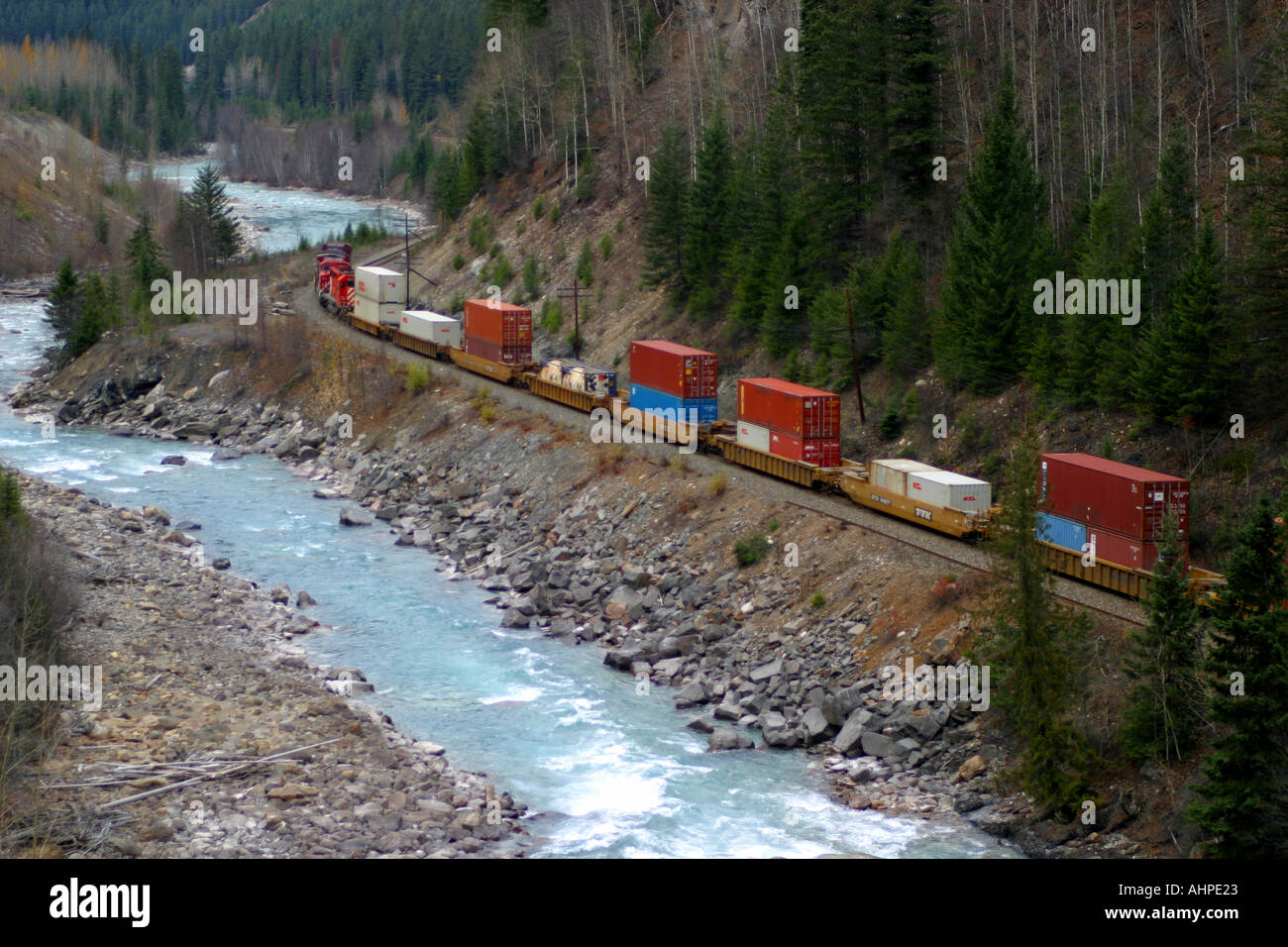 Horizontal Freight train travelling through the Rocky Mountains Stock ...