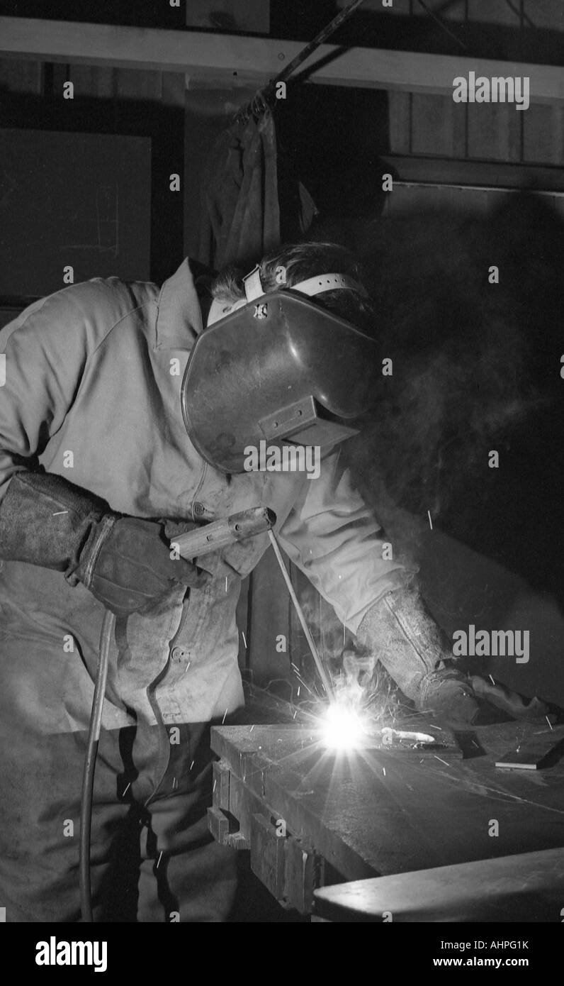 Electric arc welder performing task Stock Photo - Alamy