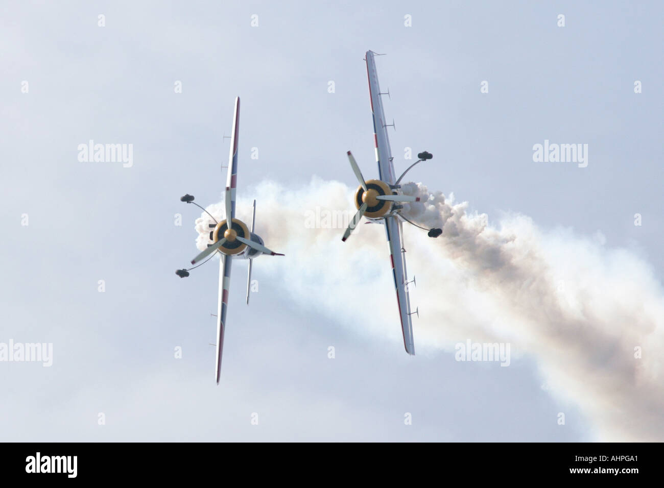 Two Acrobatic planes in very close formation Stock Photo - Alamy