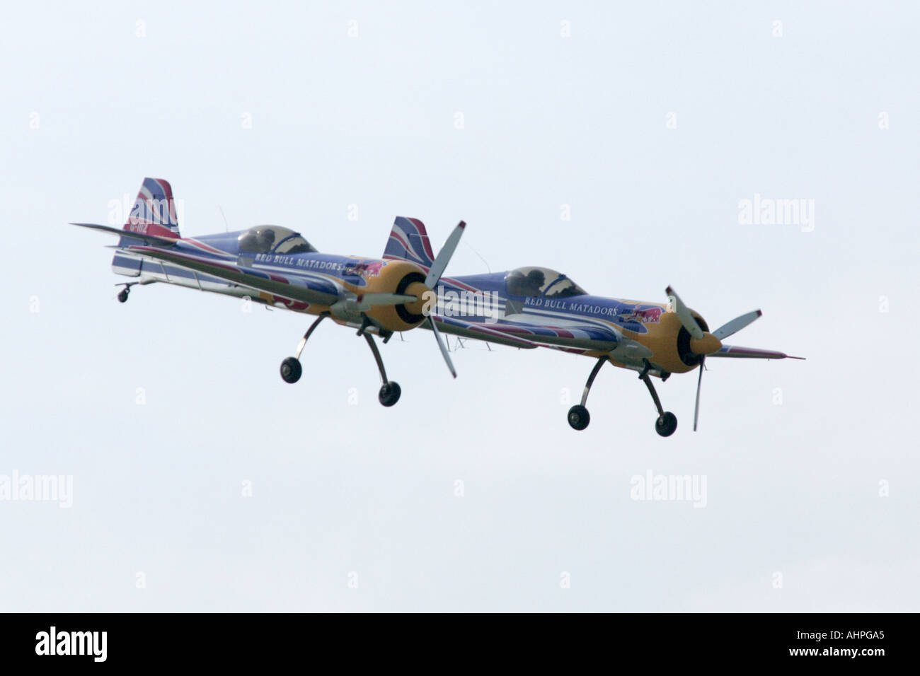 Two Acrobatic planes in very close formation Stock Photo - Alamy