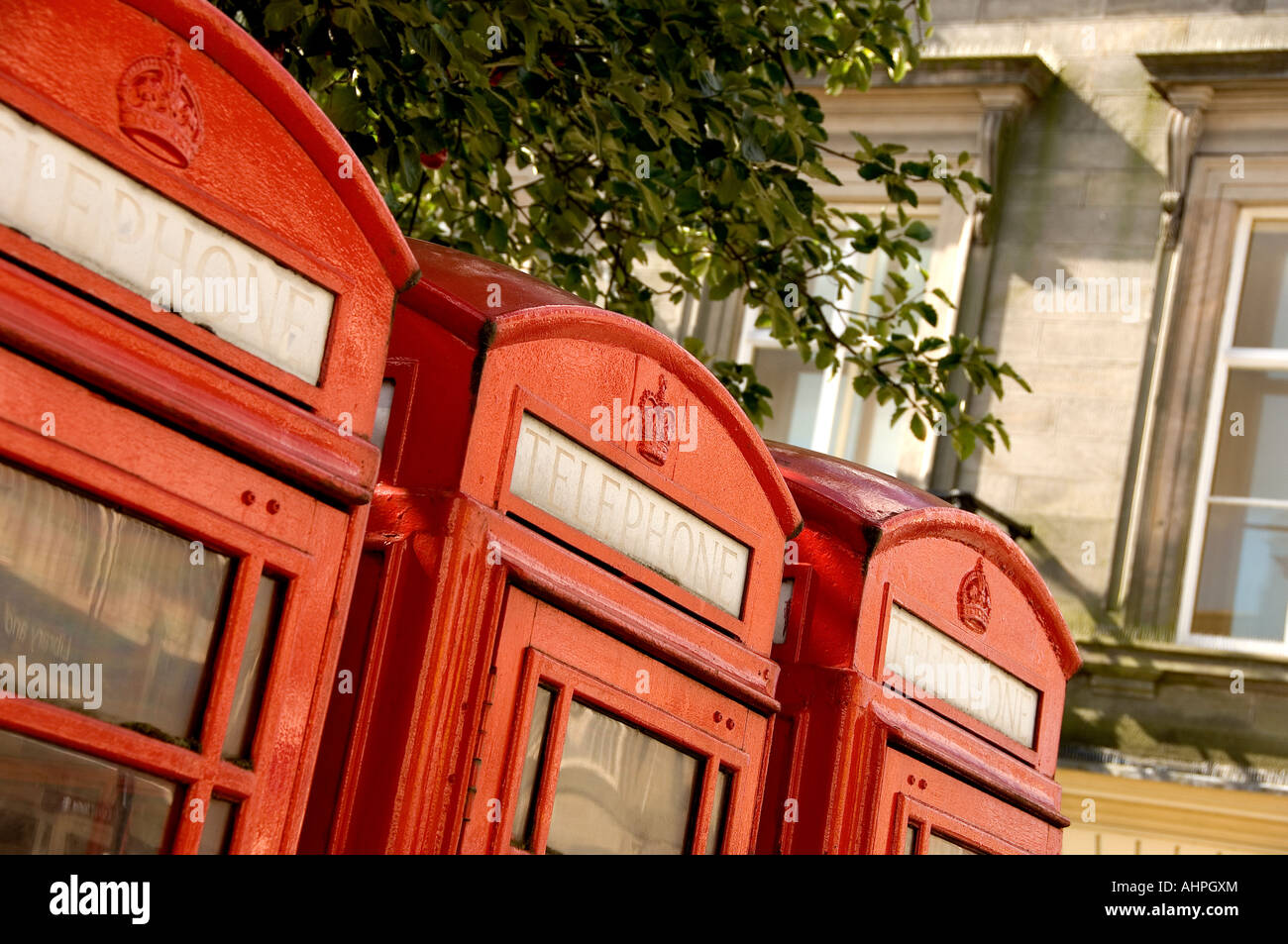 Line of old red telephone phone boxes England UK United Kingdom GB ...