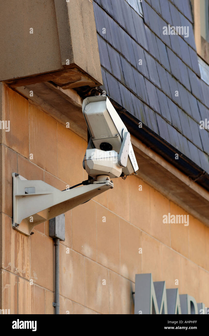CCTV camera seen here on the wall of a bank Stock Photo - Alamy