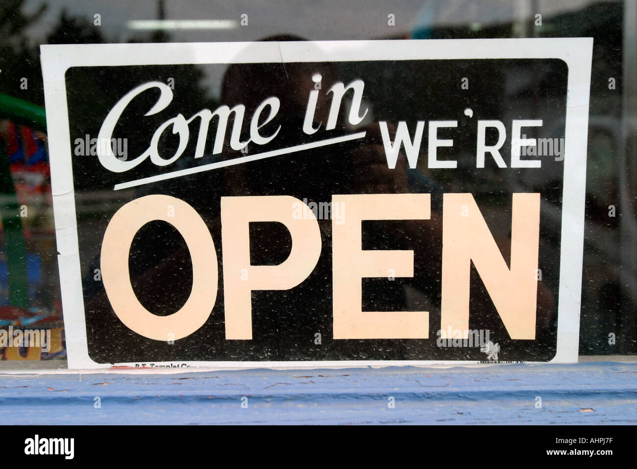 "Come in we're OPEN" sign in shop window Stock Photo - Alamy