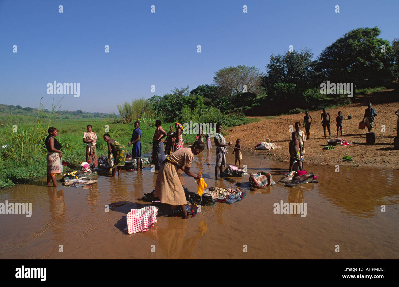 African women wash in river hi-res stock photography and images - Alamy