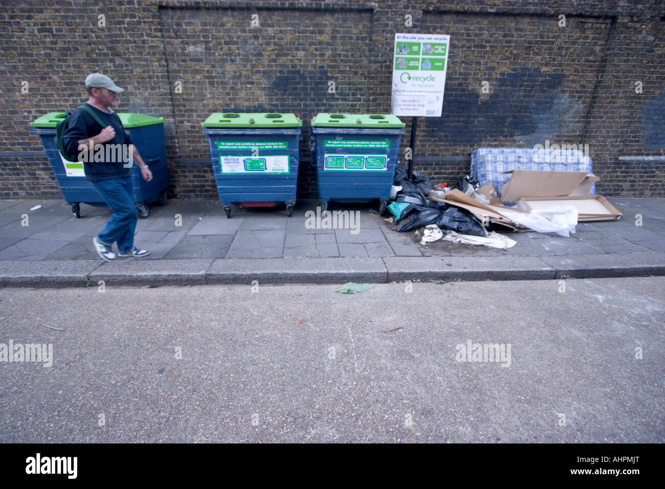 unkempt recycling centre with piles of rubbish essex Stock Photo - Alamy