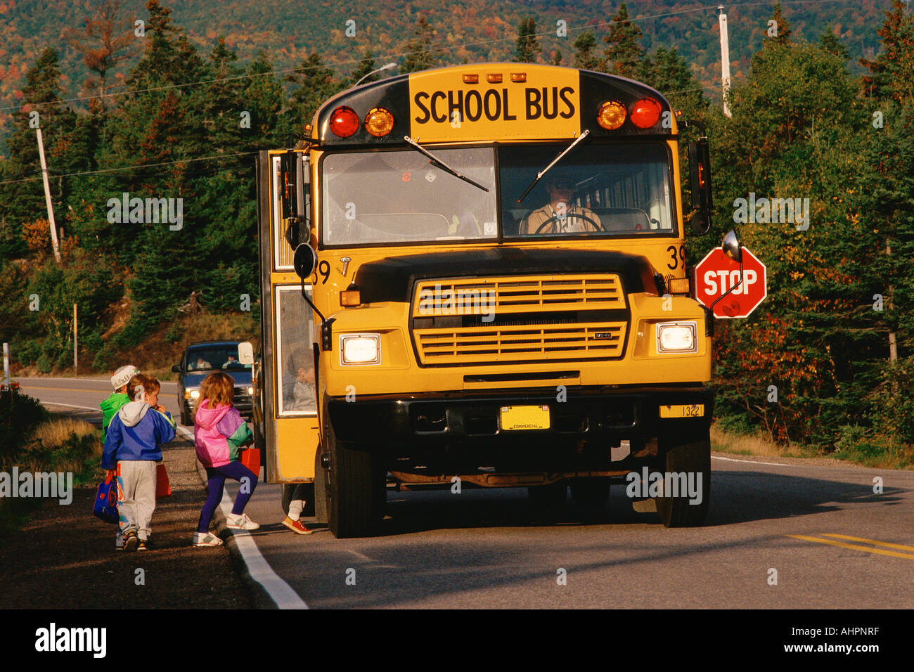 Children boarding school bus hi-res stock photography and images - Alamy
