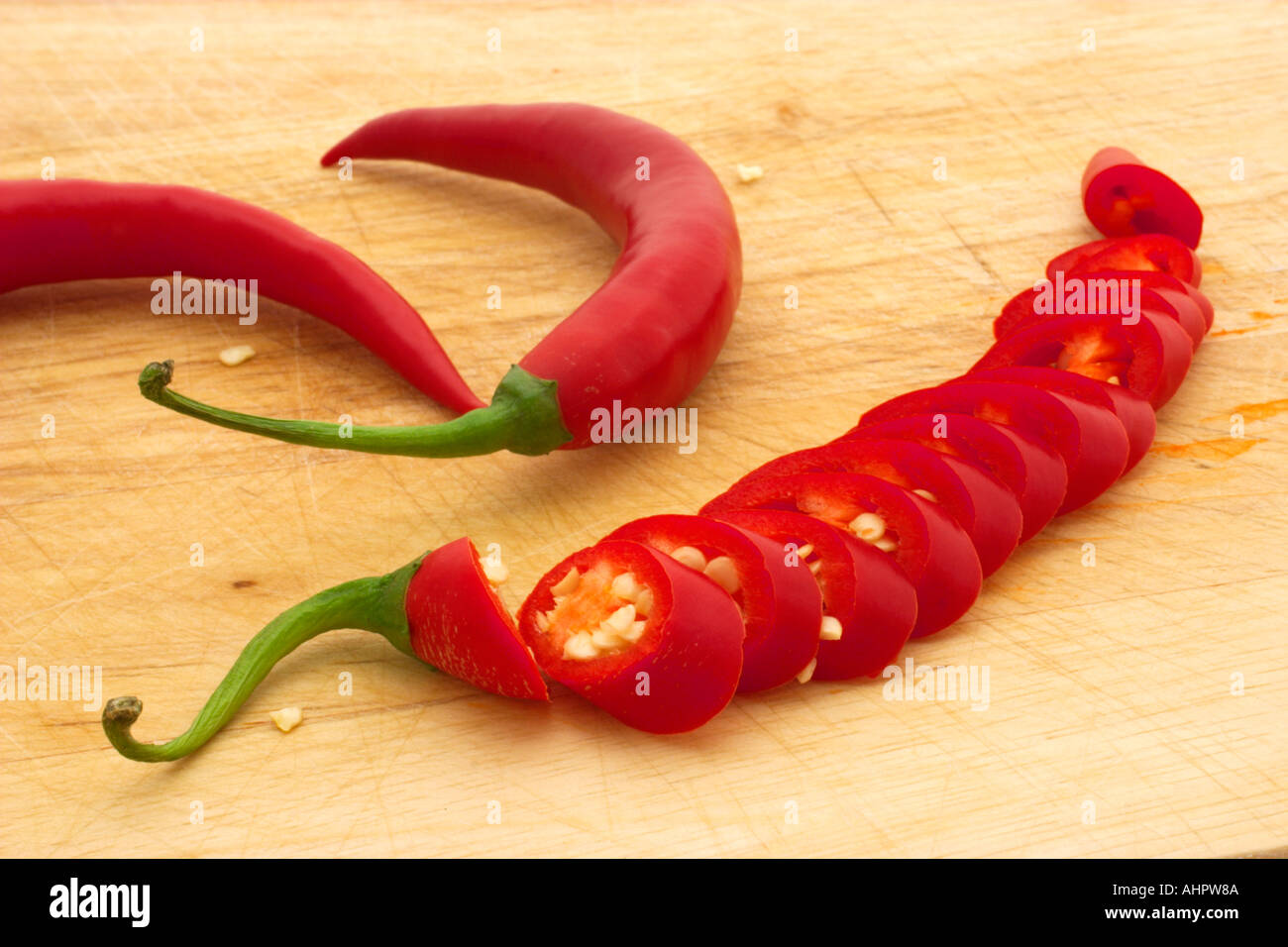 Still life of chopped red chillies Stock Photo - Alamy