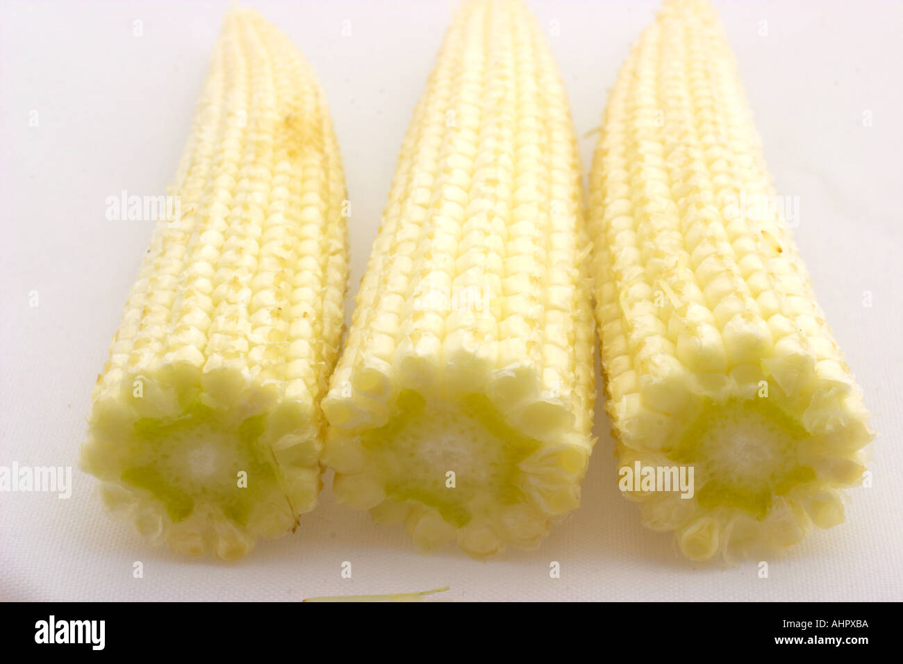 Still life of baby sweet corn Stock Photo - Alamy