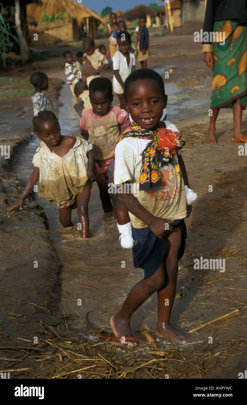 Black Kids Playing In The Rain
