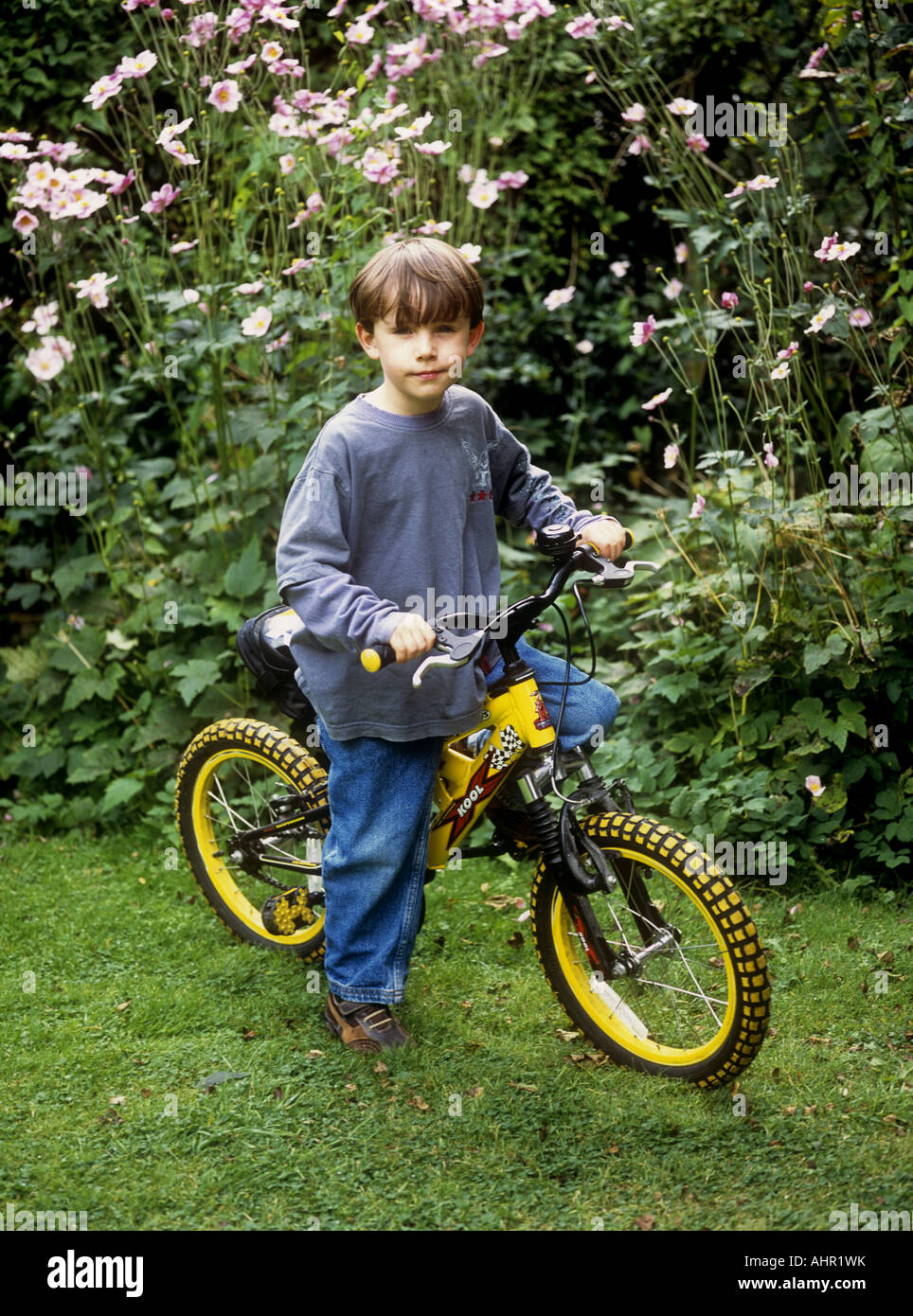 Boy on his bike Stock Photo - Alamy