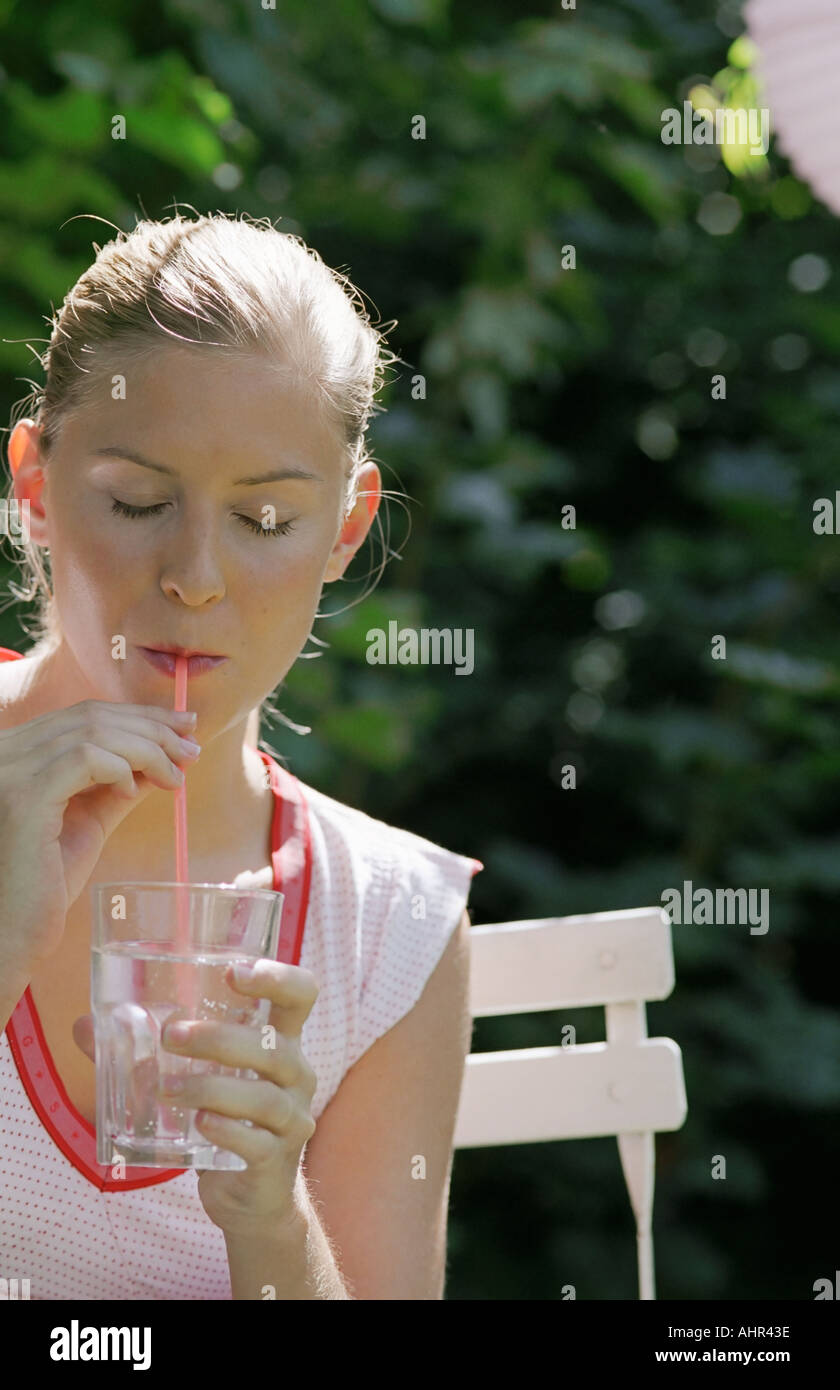 Sipping drinks straw hi-res stock photography and images - Alamy
