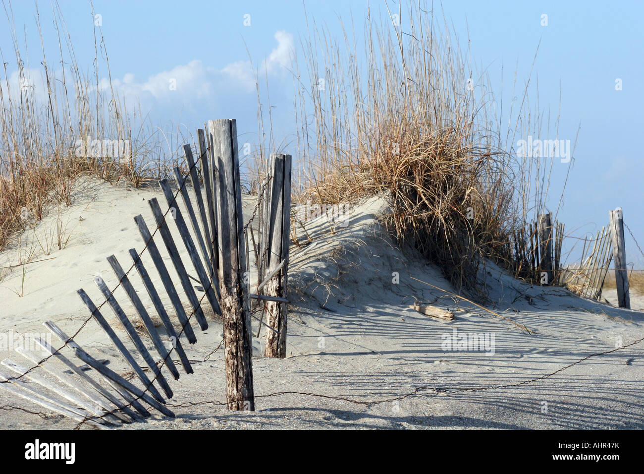 An old fence in the dunes at a beach Stock Photo - Alamy