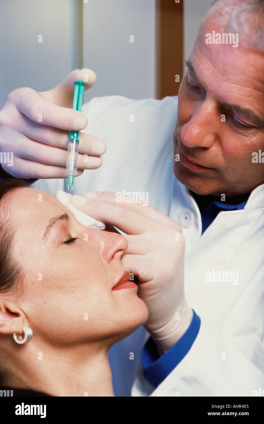 Woman having neurotoxin injection Stock Photo - Alamy
